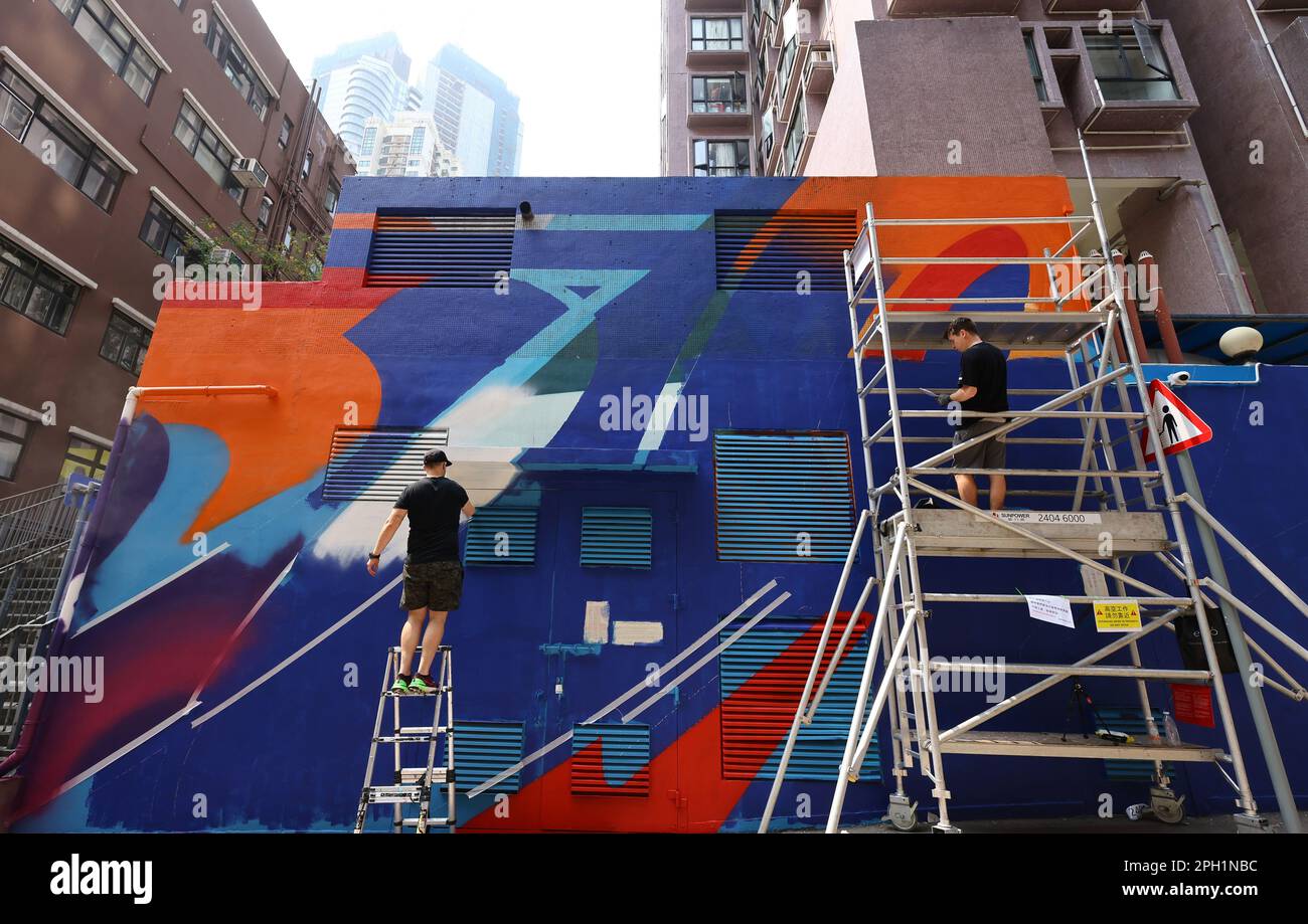 Day 1 of HKwalls HHstreet mural paintings festival; Artist JURNE from ...