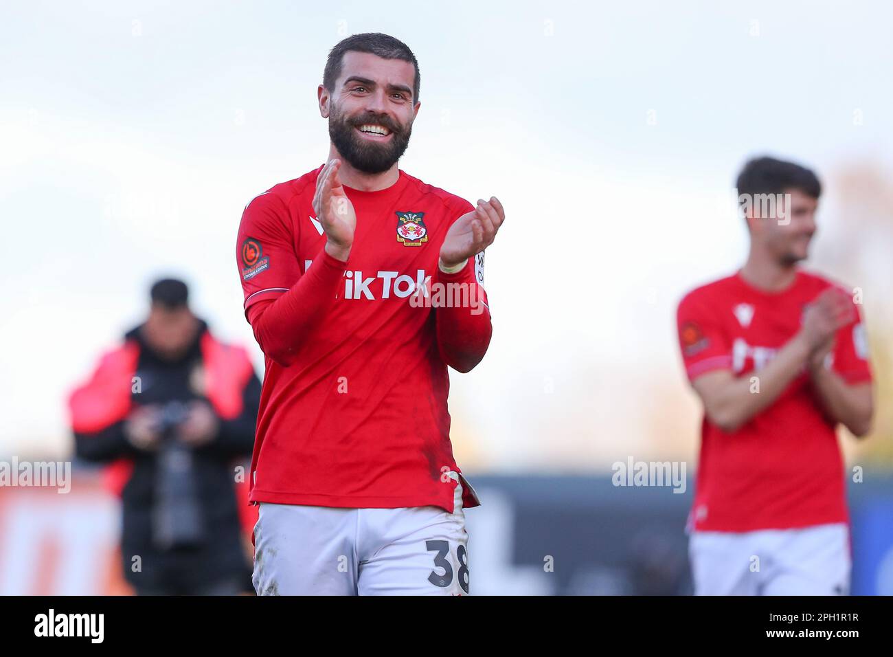 Elliot Lee #38 of Wrexham applauds the home fans after the Vanarama National League match ...