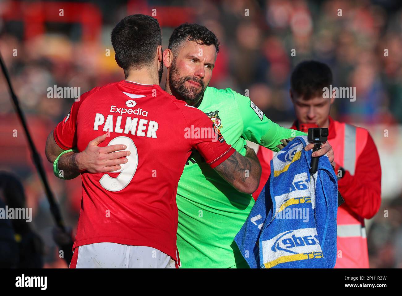 Ollie Palmer #9 of Wrexham and Ben Foster #12 of Wrexham embrace after ...