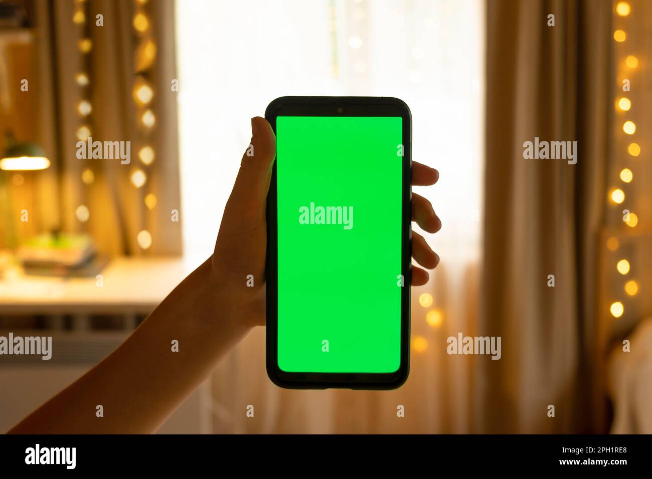 Smartphone with Green Mock-up Screen. Green Chroma Key Screen Device ...