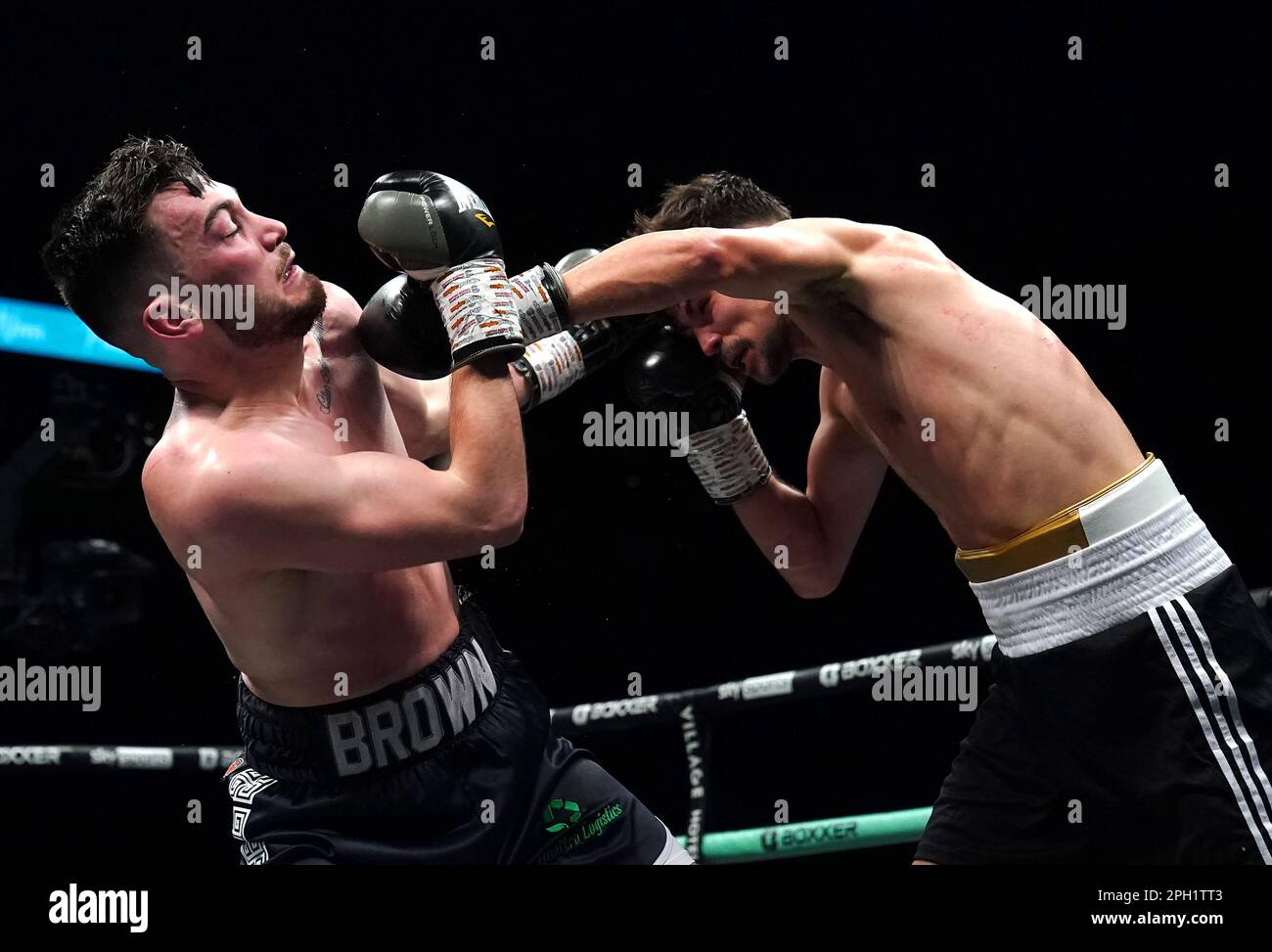 Casey Brown (left) and Harvey Lambert in the super welterweight bout at ...