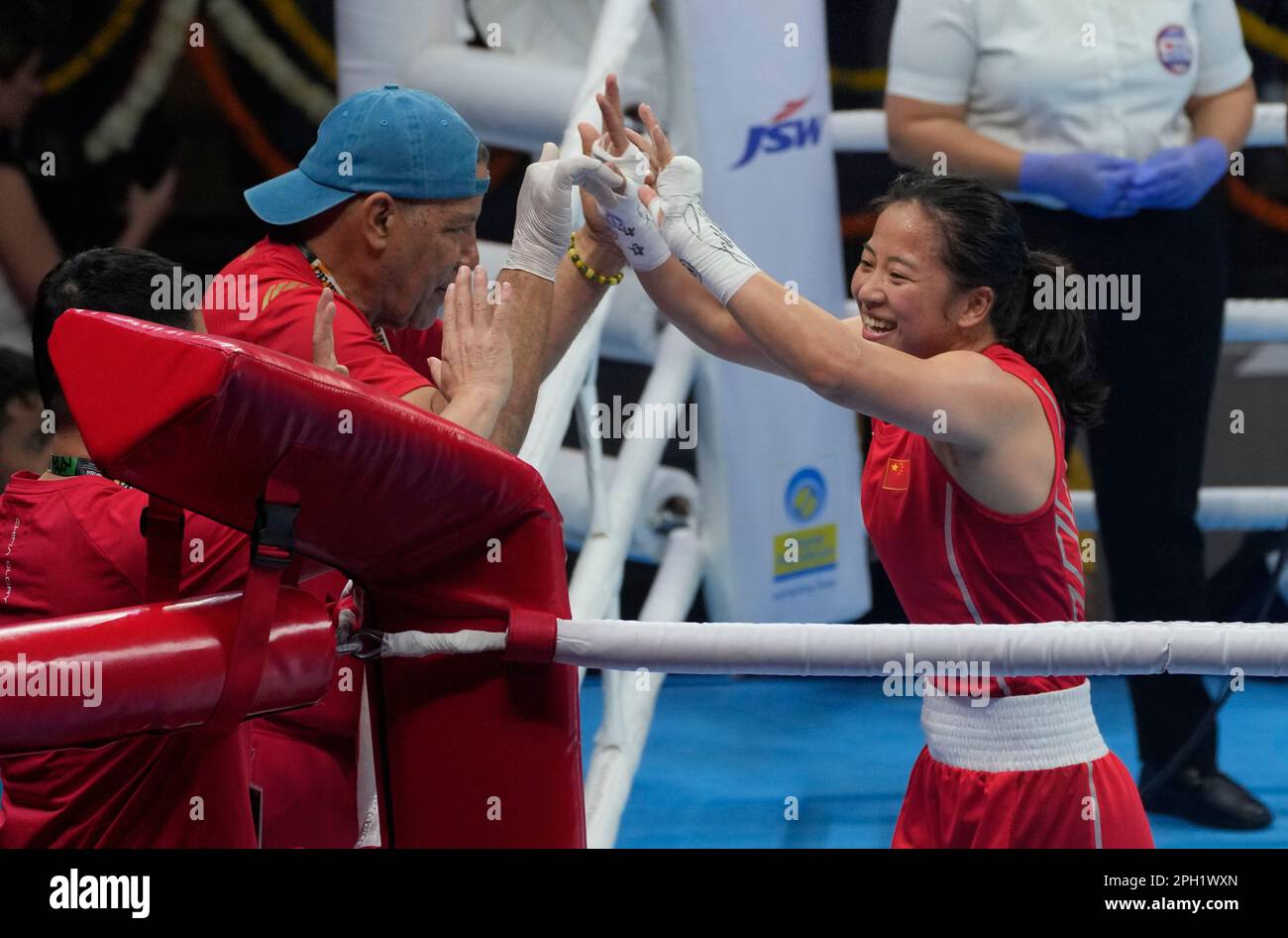 China's Wu Yu, in red, celebrates after wining against Italy's Sirine ...