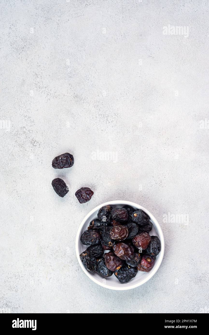 Raw Organic Arabic Dates, Ajwa Dates on light gray background. Ramadan ...