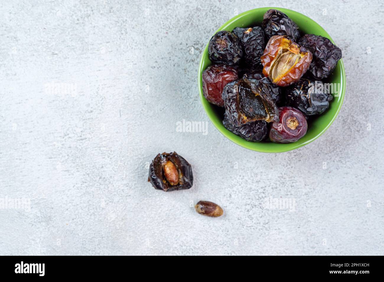 Raw Organic Arabic Dates, Ajwa Dates on light gray background. Ramadan ...