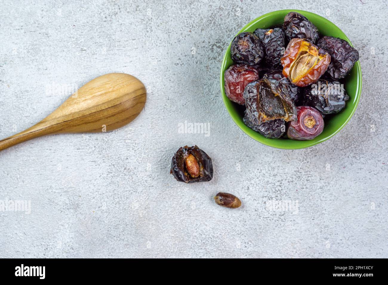 Raw Organic Arabic Dates, Ajwa Dates on light gray background. Ramadan ...
