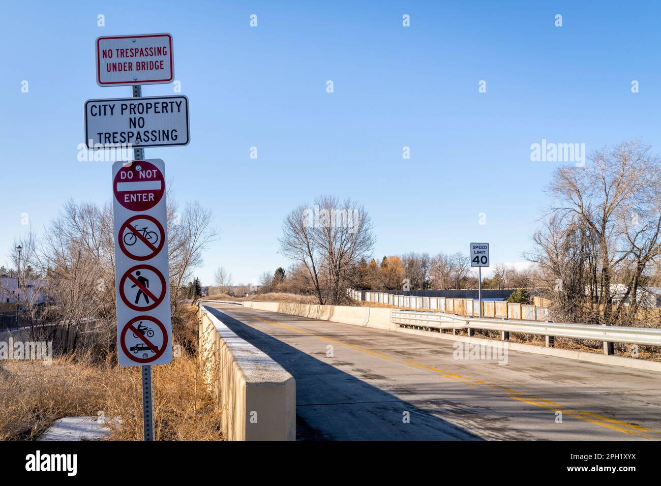 dedicated bus corridor with warning road signs in Fort Collins ...