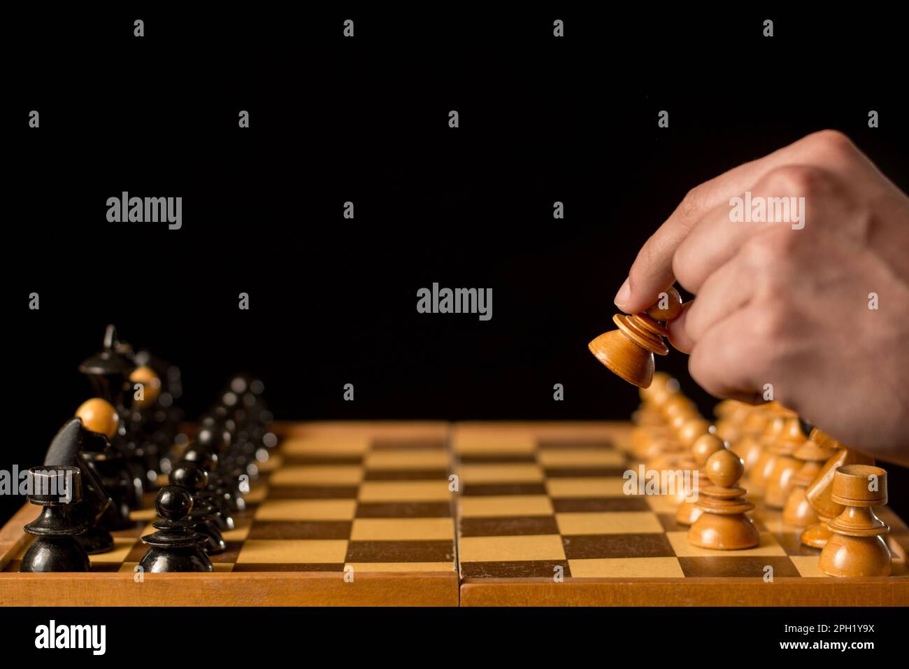 chess player plays at the chessboard Stock Photo - Alamy