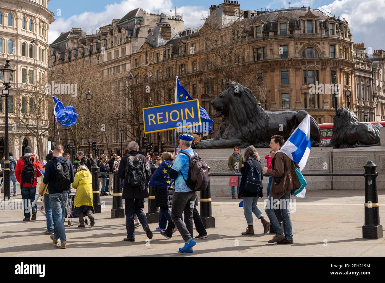 London, UK. 25th Mar, 2023. Activists hold European flags and a placard ...