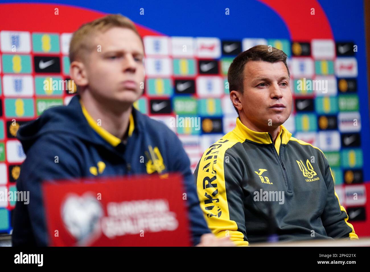 Ukraine manager Ruslan Rotan (right) with Oleksandr Zinchenko during a ...
