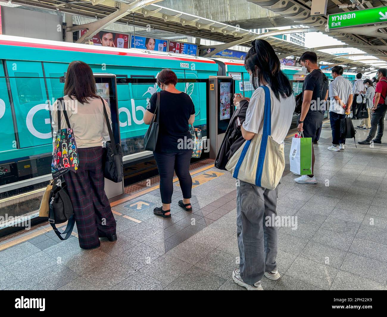 Bangkok, Thailand, Group Women Waiting on Platform inside Sky Train ...