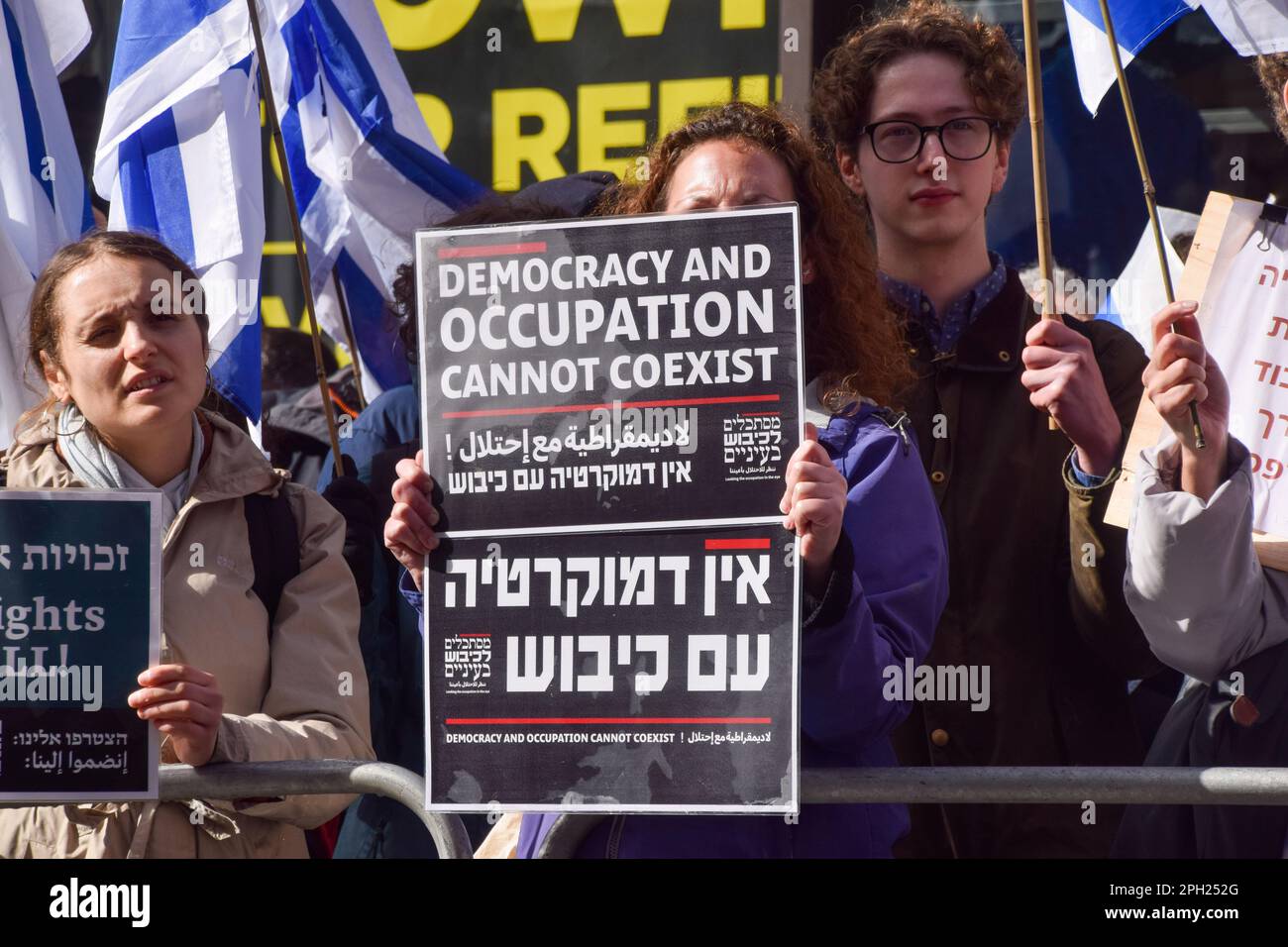 London, UK. 24th March 2023. Crowds of British Israelis staged a ...