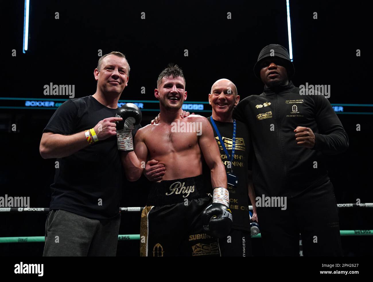 Rhys Edwards (centre left) and his team celebrate victory in the super ...