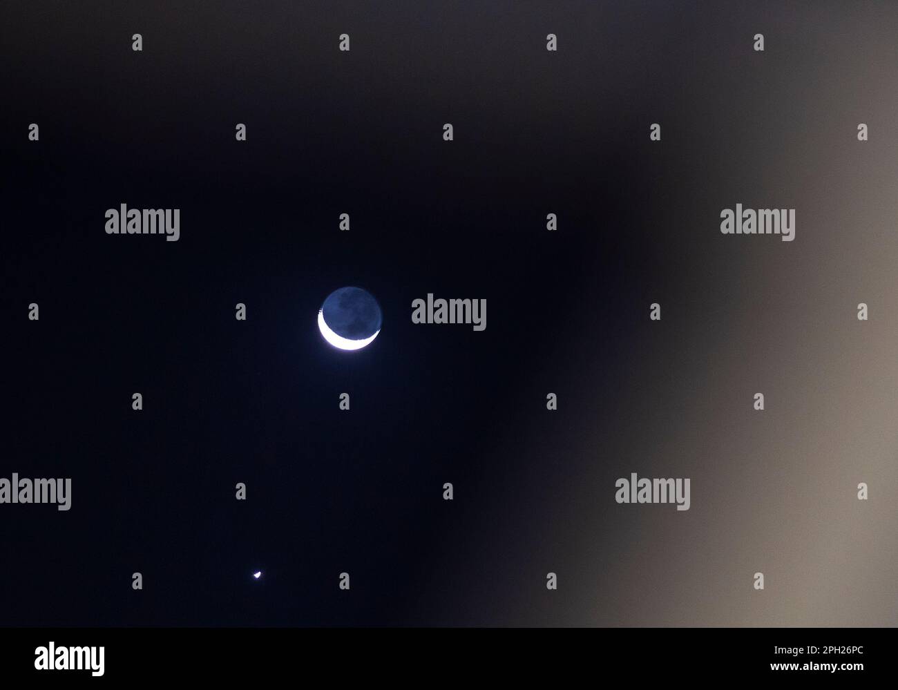 The crescent moon appears in the sky of Gaza, on the third day of the ...