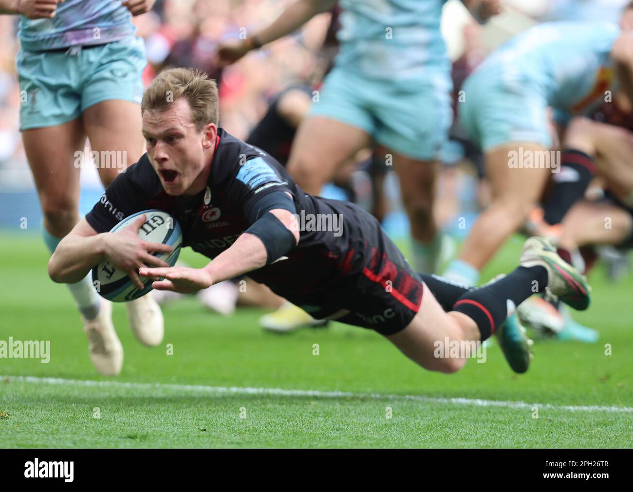 London, UK. 25th Mar, 2023. Nick Tompkins of Saracens goes over for his ...