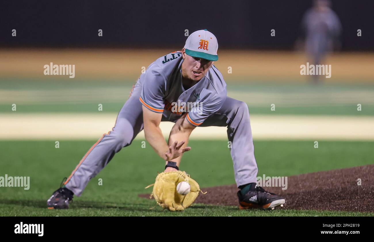 March 24, 2023: University of Miami junior Ben Chestnutt (44) fields ...