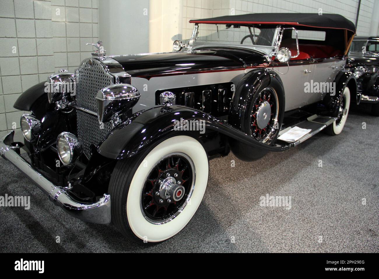 Vintage 1920s black and silver limousine in the garage, New York, NY ...