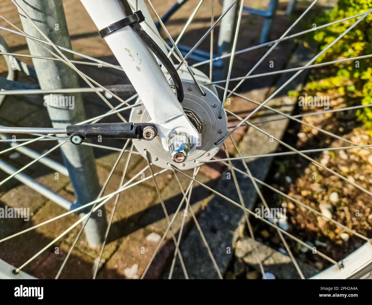 Close up of spinning wheel from sporty bike Stock Photo - Alamy