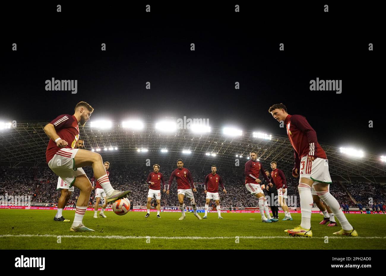 Wales' warm up prior to the UEFA Euro 2024 Group D qualifying match at the Stadion Poljud, Split ...