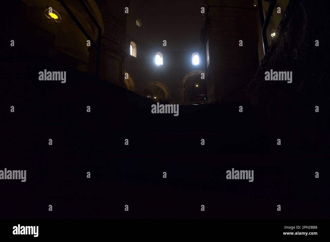 Staircase in a crypt that leads to the main nave of a church Stock ...