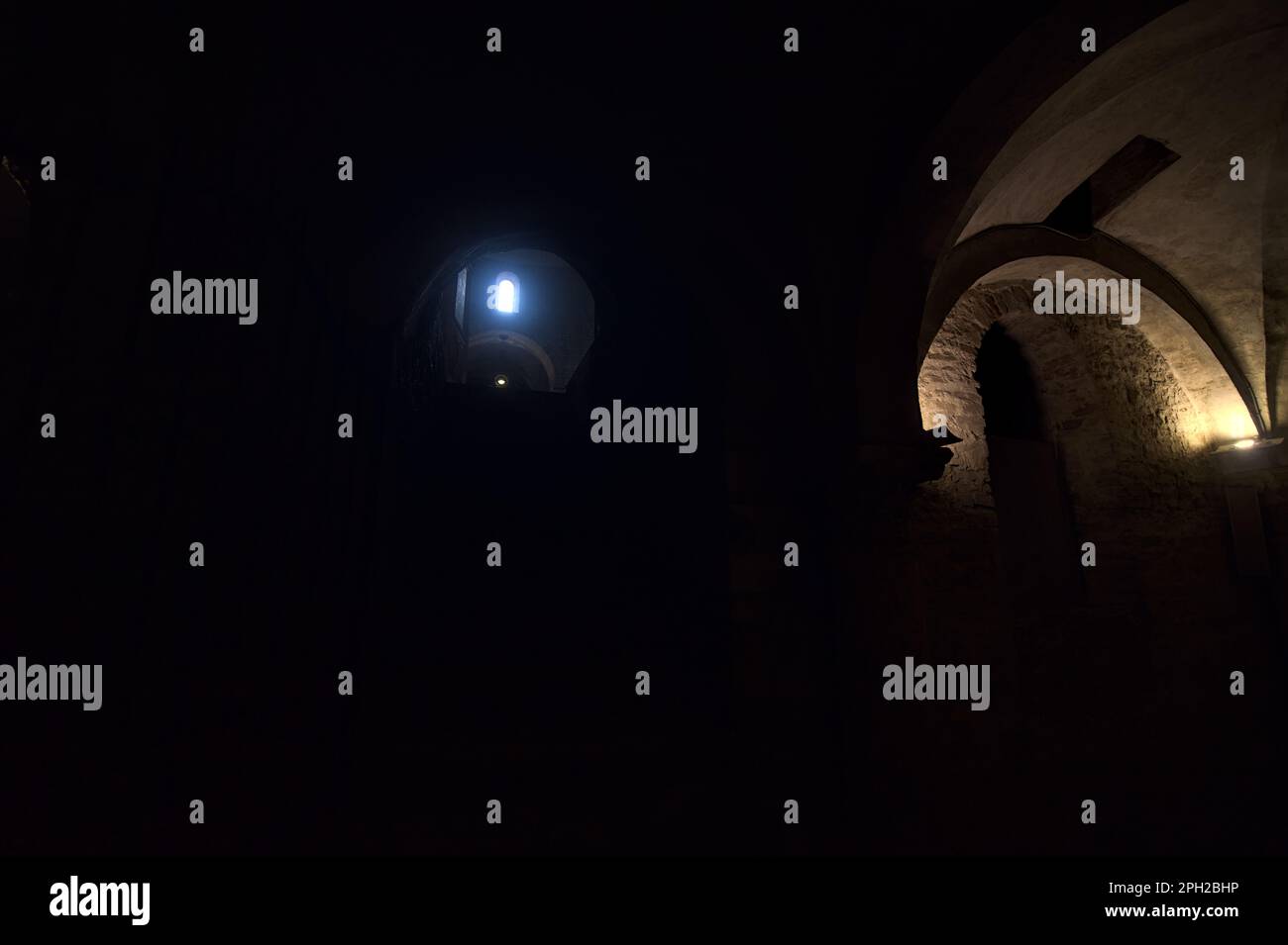 Staircase in a crypt that leads to the main nave of a church Stock ...