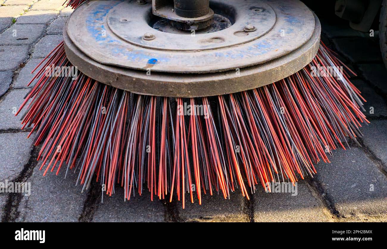 Close-up sweeper machine cleaning. Concept clean streets from debris ...