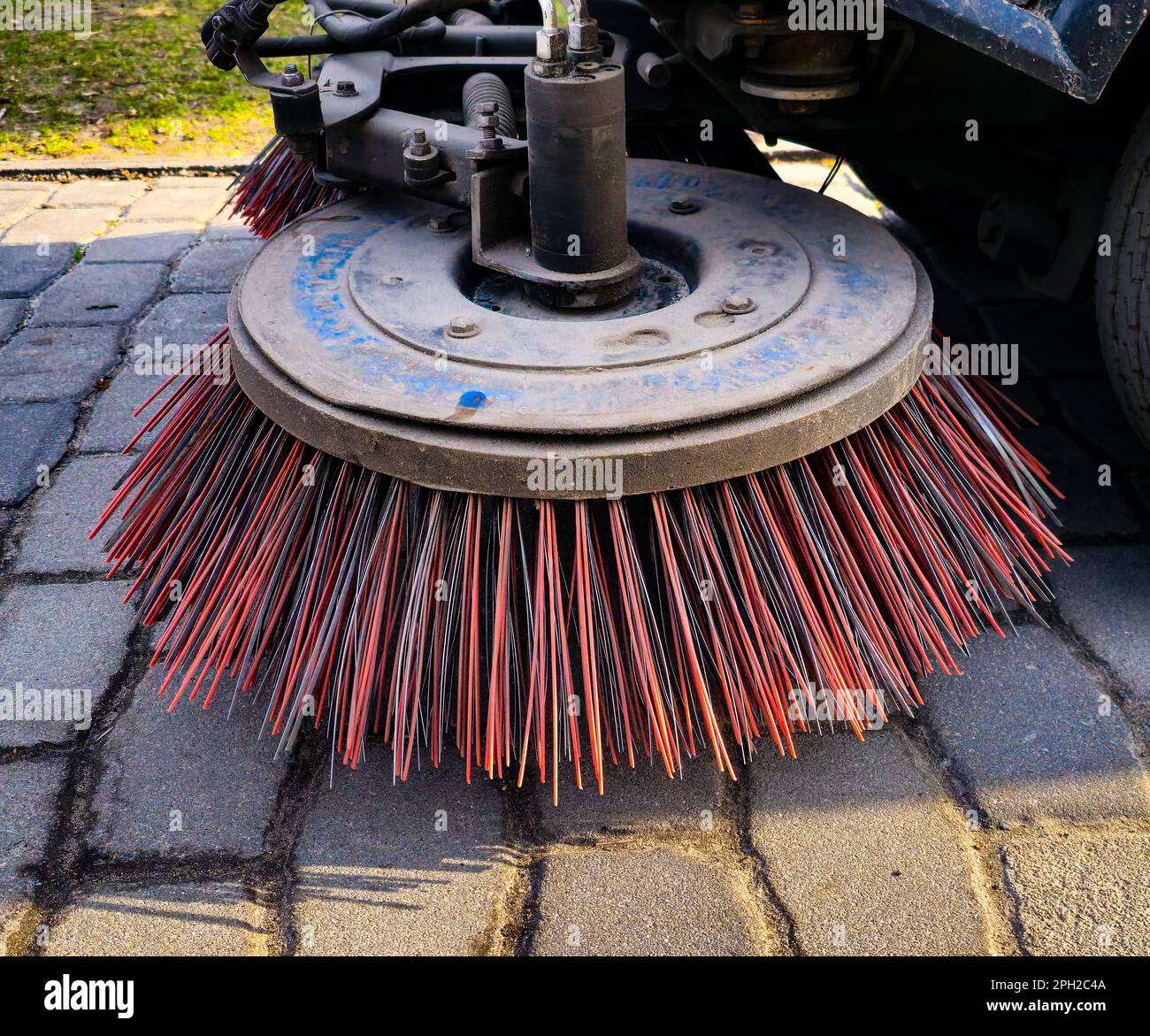 Close-up sweeper machine cleaning. Concept clean streets from debris ...