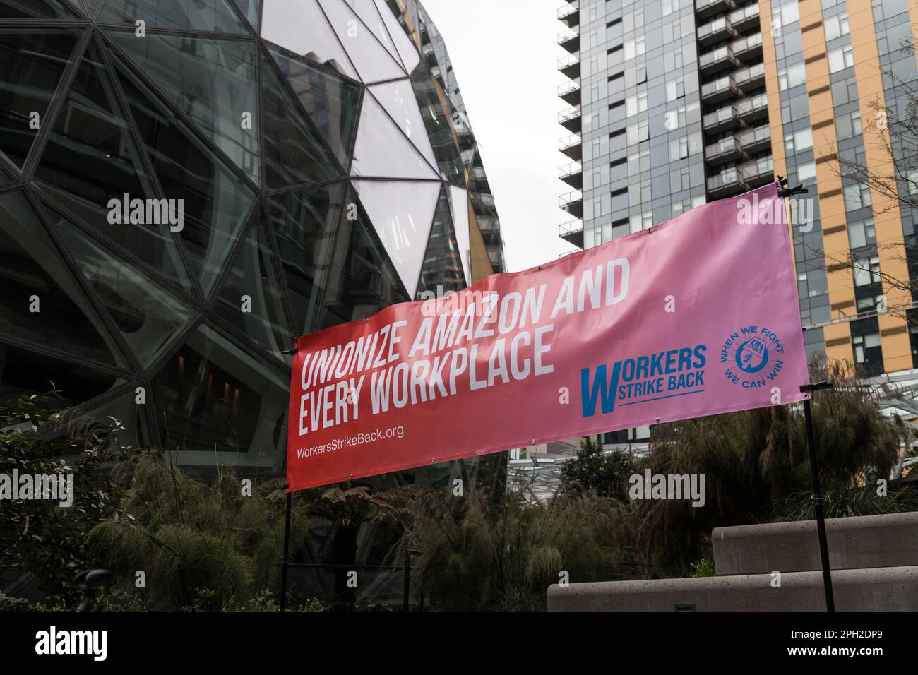 Seattle, USA. 25th Mar, 2023. Mid-day a rally to unionize Amazon and ...