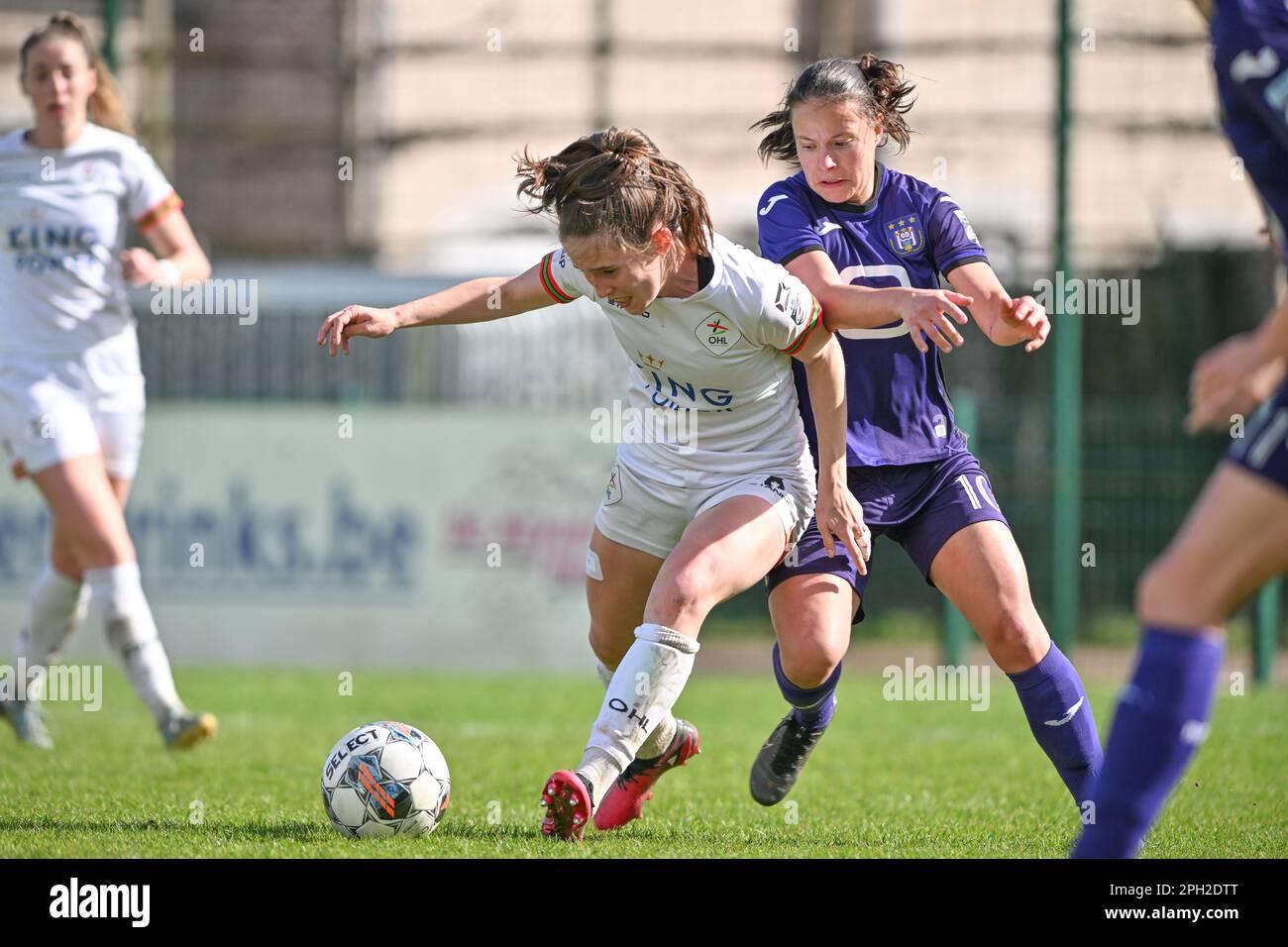 Zaventem, Belgium. 25th Mar, 2023. Marie Detruyer (8) of OHL and Stefania Vatafu (10) of ...
