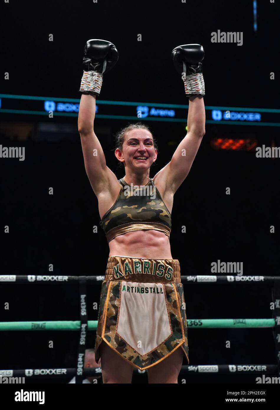 Karriss Artingstall celebrates victory in the super featherweight bout ...