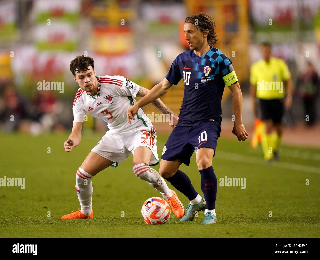 Wales' Neco Williams (left) and Croatia's Luka Modric battle for the ...
