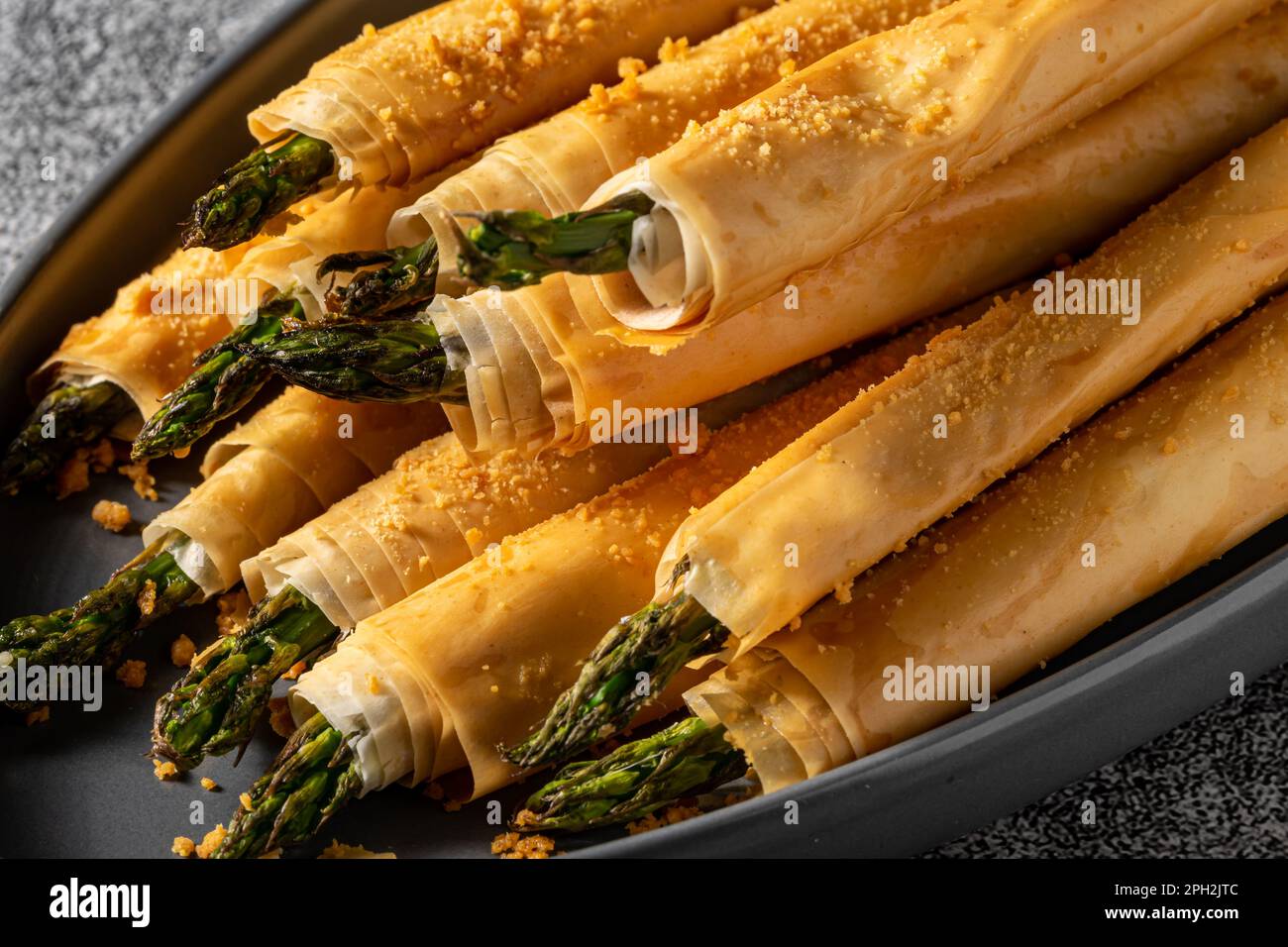 Rolled phyllo dough in hi-res stock photography and images - Alamy
