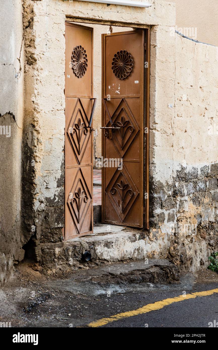 Metal Door with patterns at a village house, Fanja, Oman Stock Photo ...