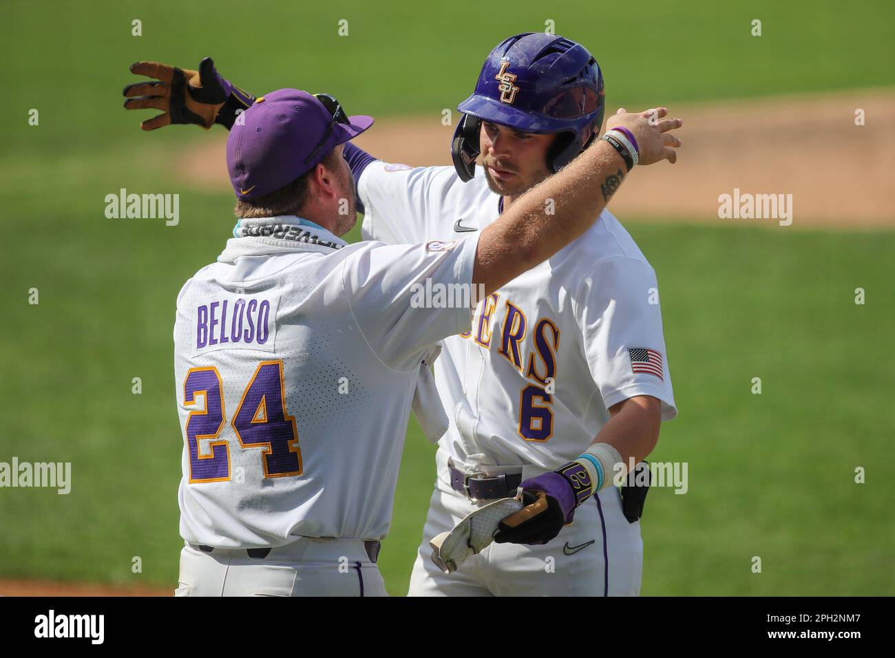 Baton Rouge, LA, USA. 25th Mar, 2023. LSU's Cade Beloso (24) hugs ...