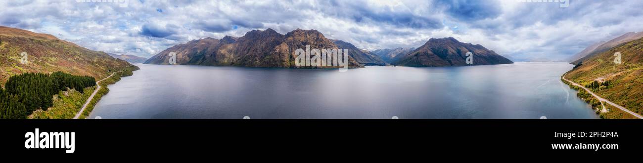 Wide aerial panorama over lake Wakatipu of South Island in New Zealand ...