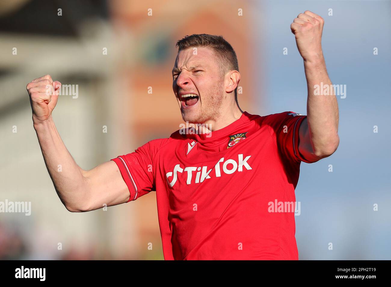 Paul Mullin #10 of Wrexham celebrates his teams win after the Vanarama ...