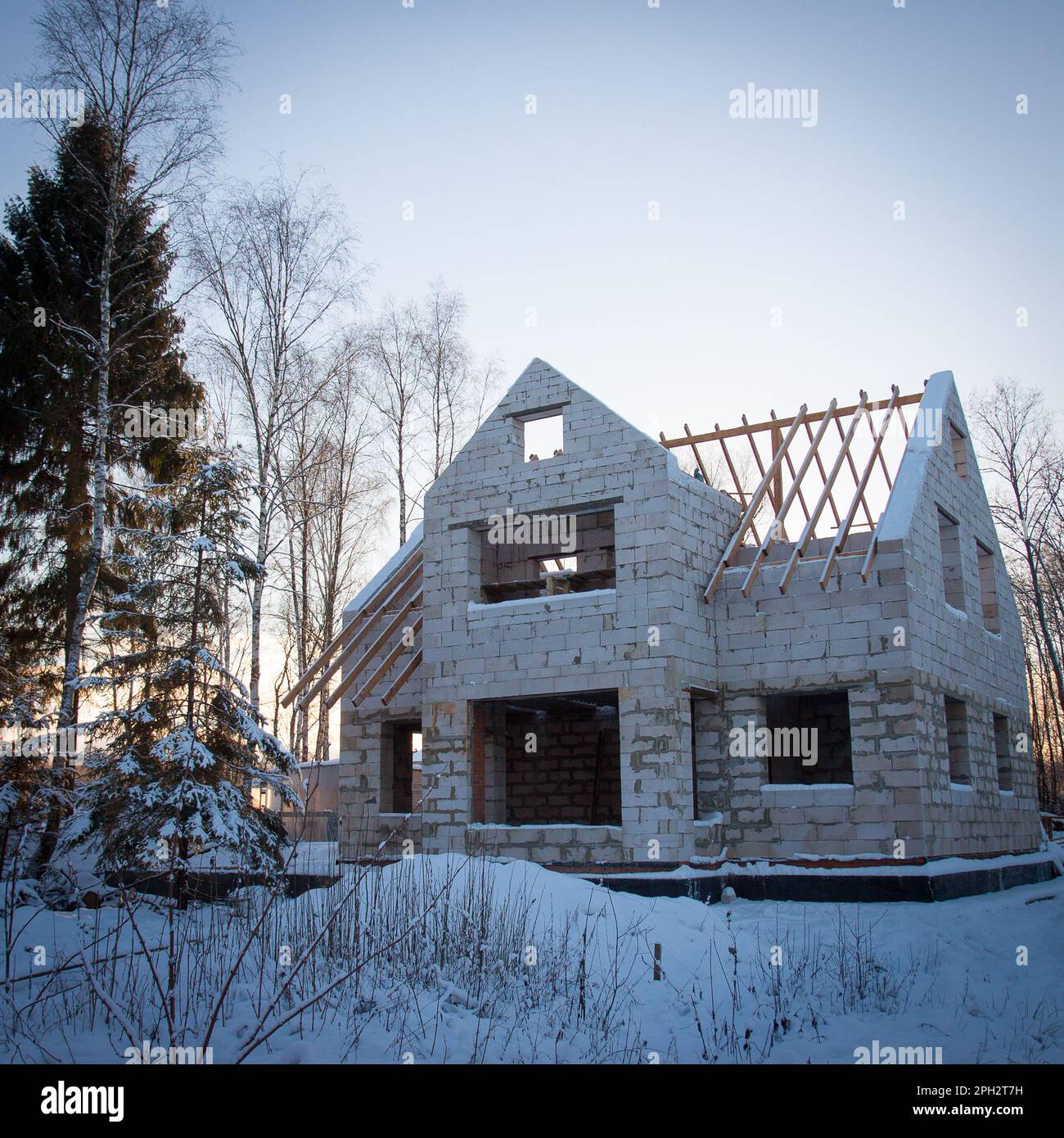 The construction of country house on winter Stock Photo - Alamy