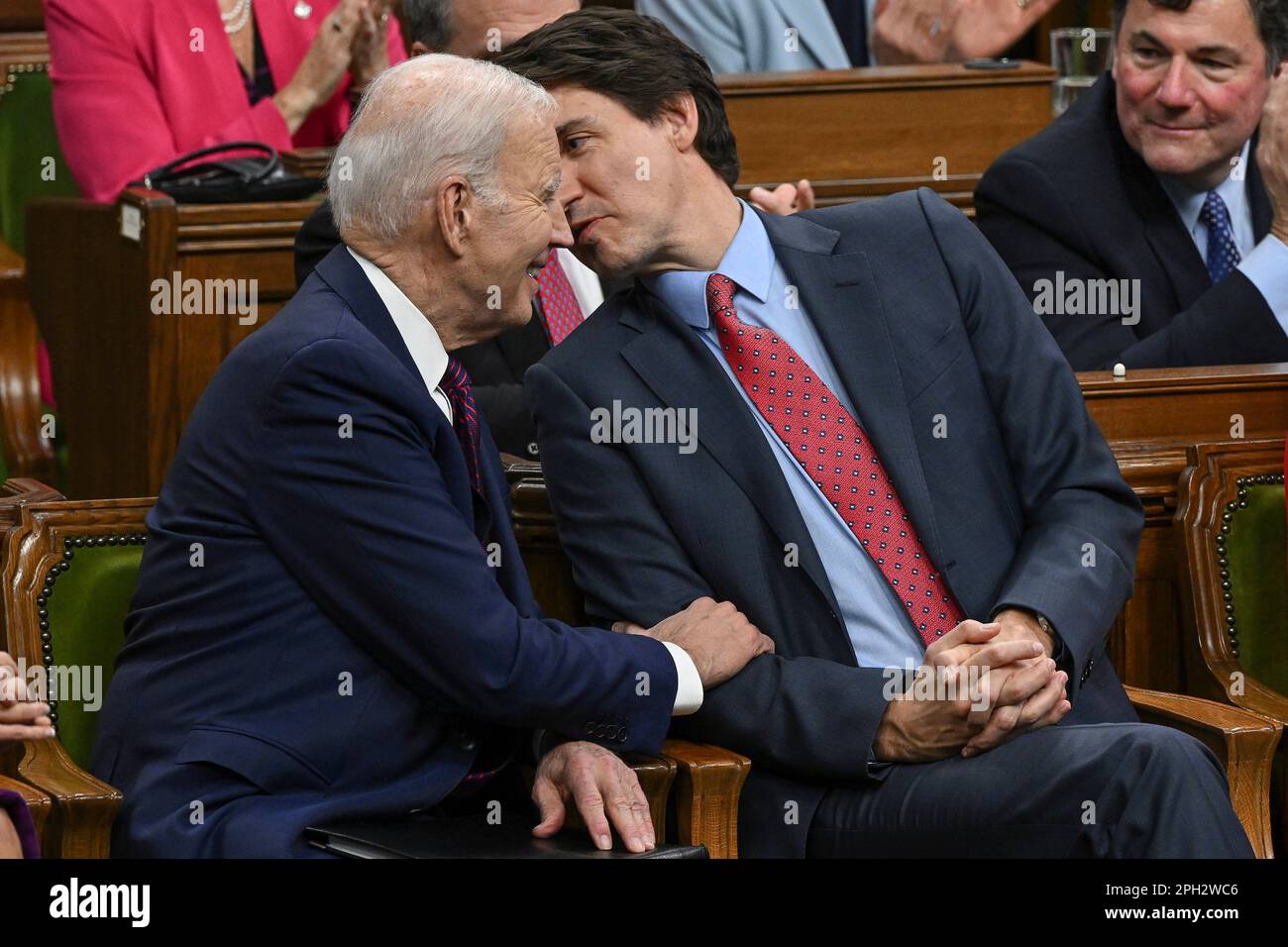 President Joe Biden speaks with Canadian Prime Minister Justin Trudeau after addressing the ...