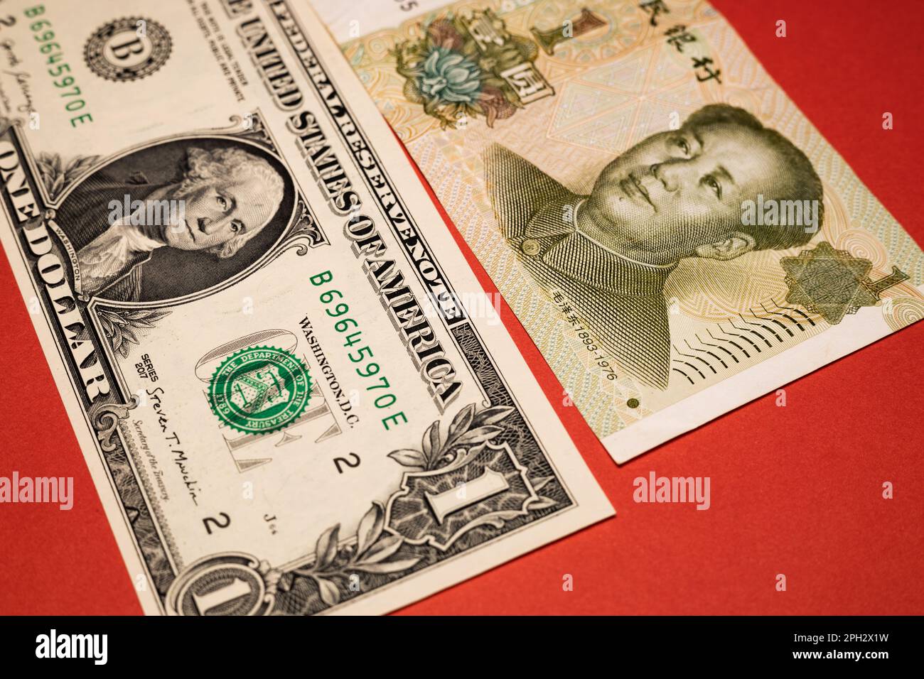 Banknotes of one Chinese yuan and One US dollar, Financial concept ...