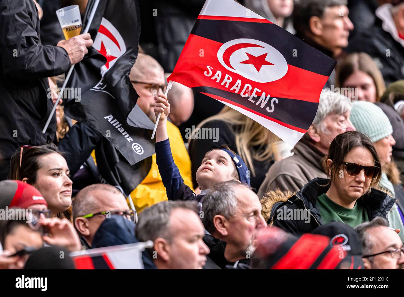 LONDON, UNITED KINGDOM. 25th, Mar 2023. A young Saracens fan (centre ...