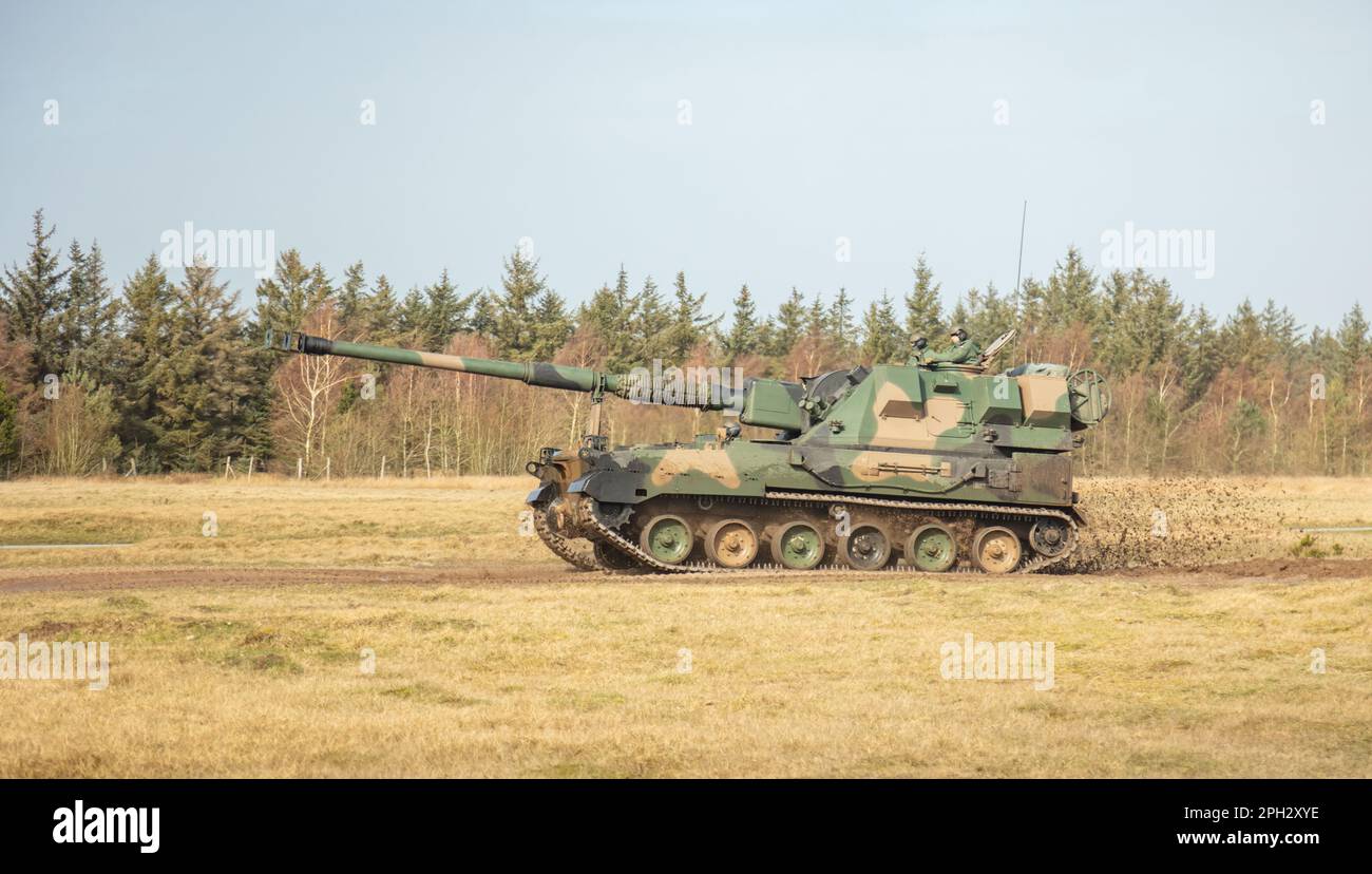 Polish soldiers assigned to the Multinational Field Artillery Brigade ...