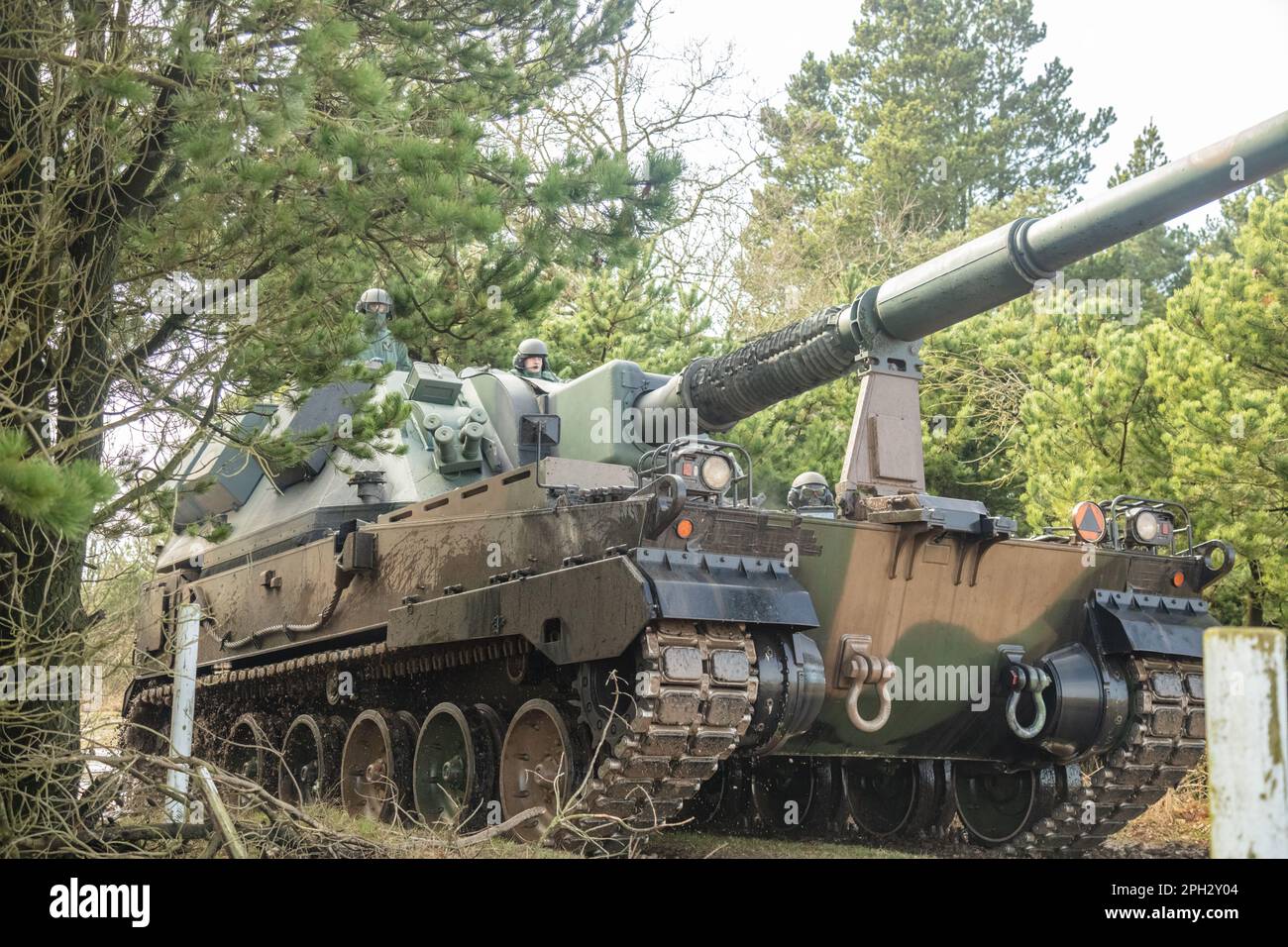 Polish soldiers assigned to the Multinational Field Artillery Brigade ...