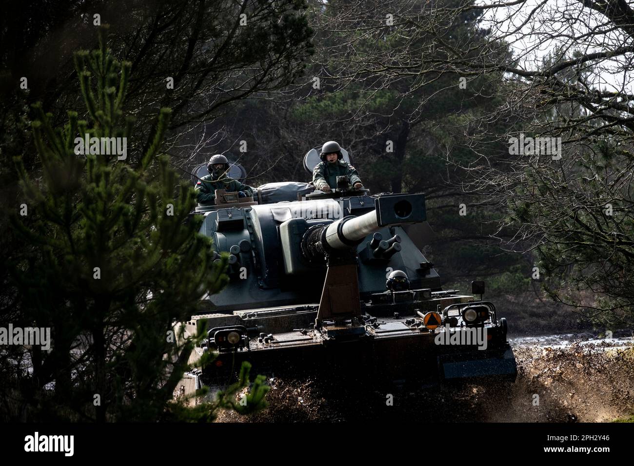 Polish Krab crews perform tactical maneuvers in rough terrain in ...