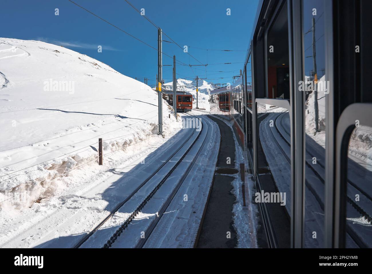 The train of Gonergratbahn running to the Gornergrat station and ...