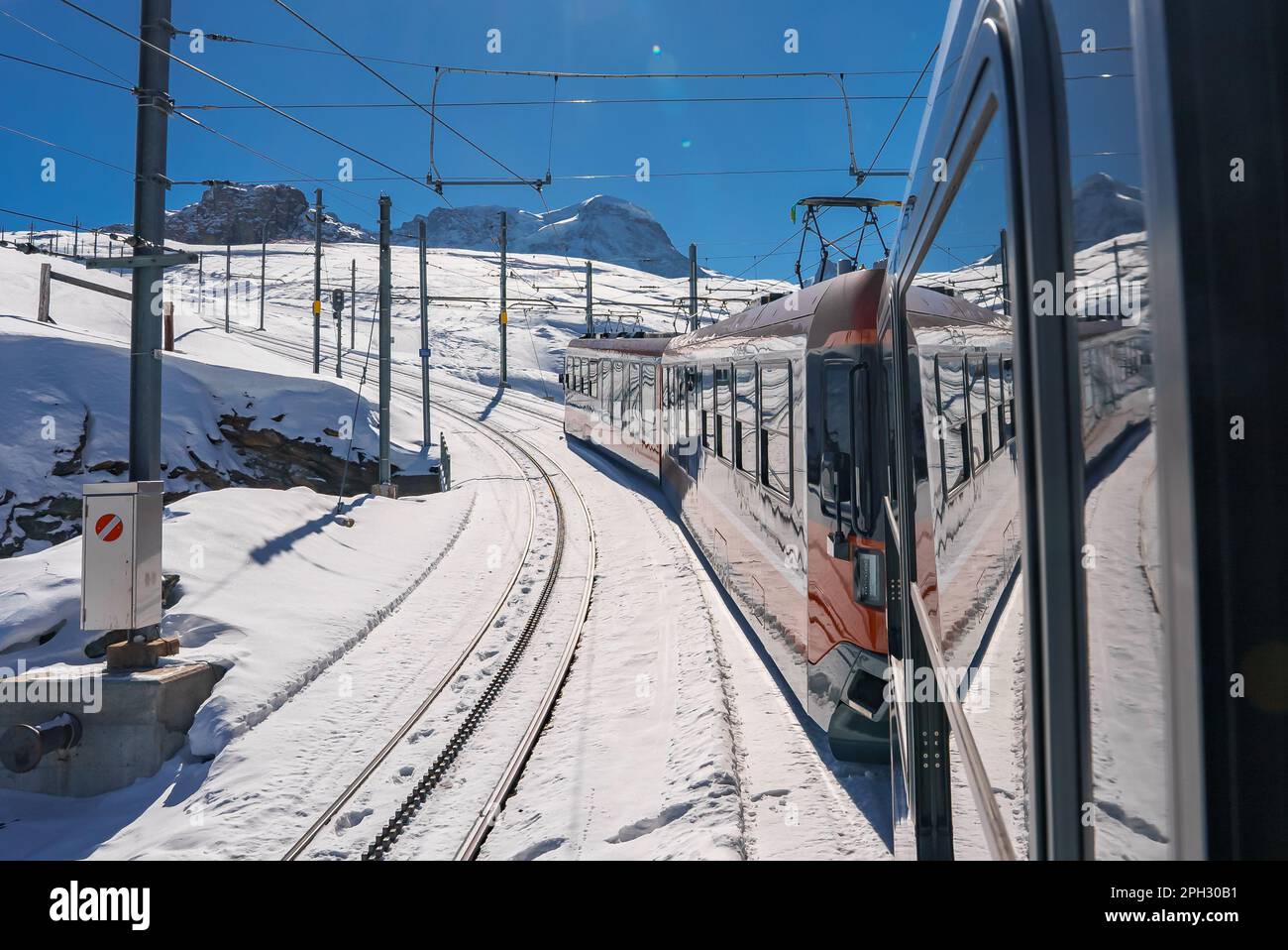 The train of Gonergratbahn running to the Gornergrat station and ...