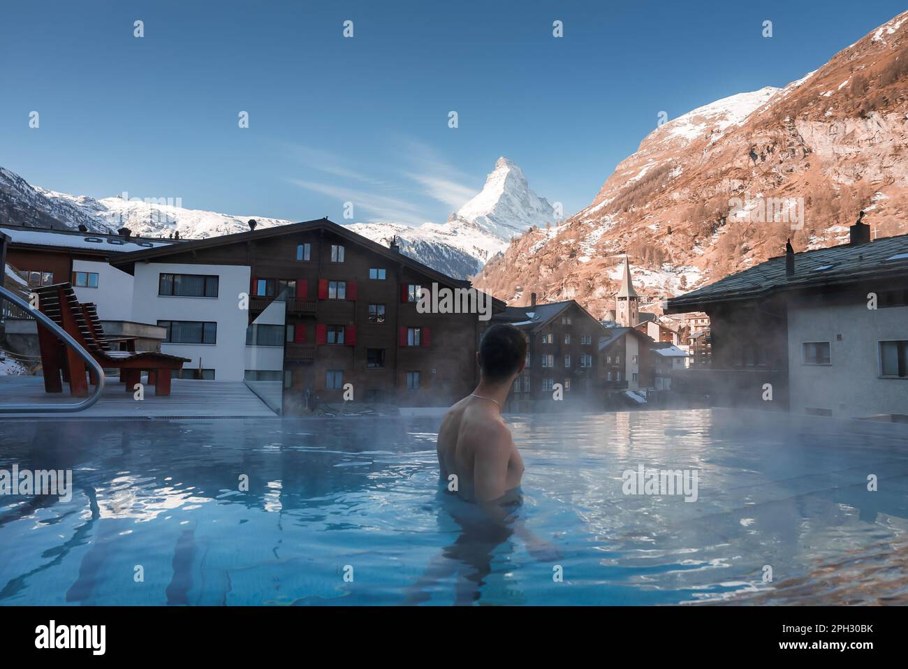 Luxury infinity outdoors pool with an amazing view at the Matterhorn ...