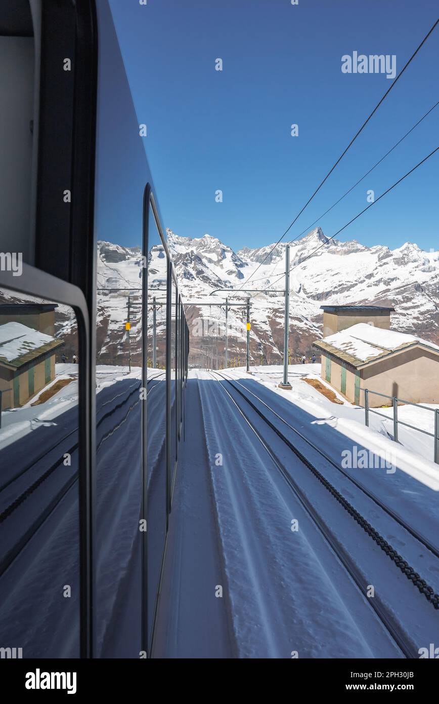 The train of Gonergratbahn running to the Gornergrat station and ...