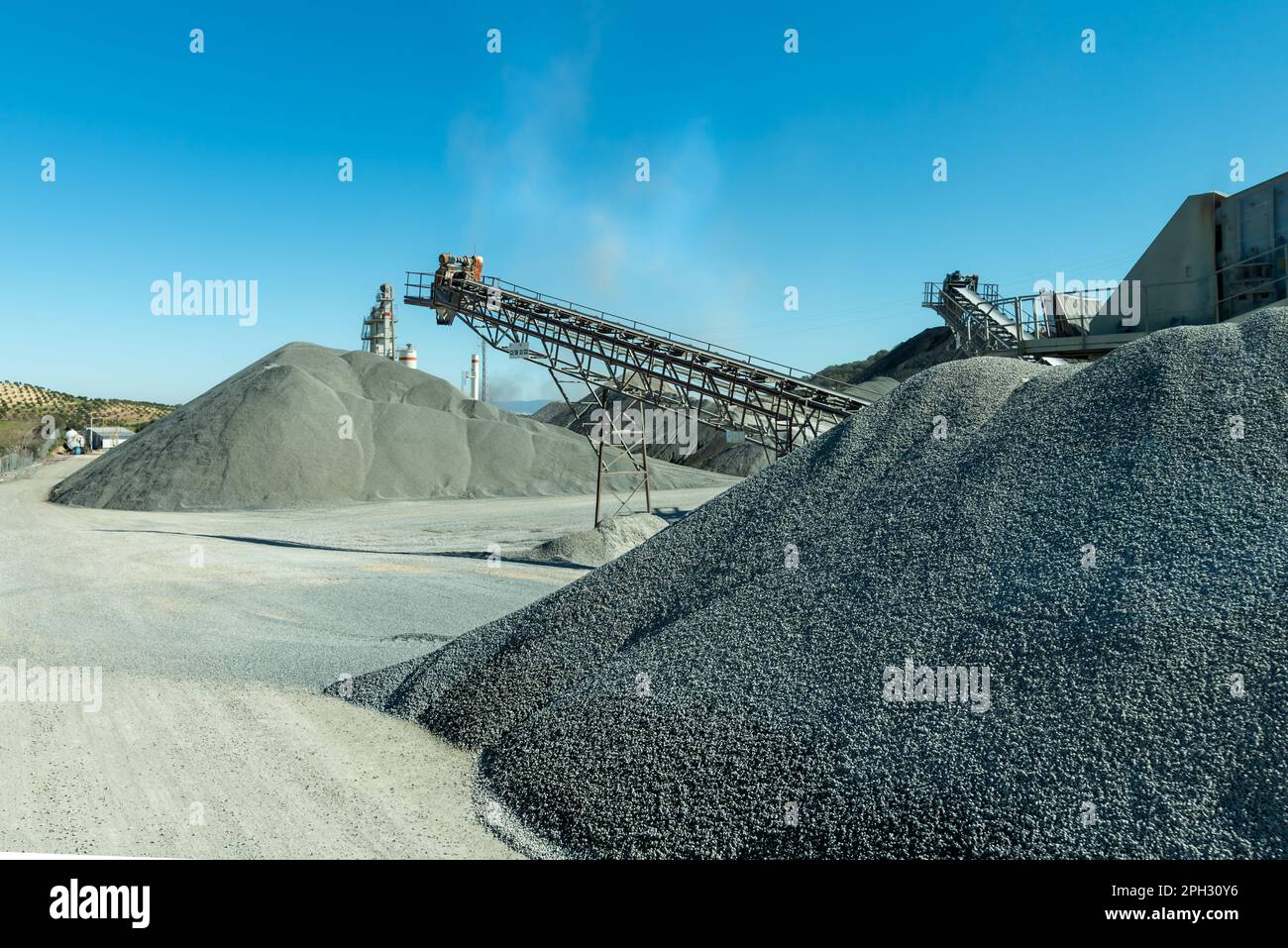 Conveyor belts in an aggregate quarry Stock Photo - Alamy
