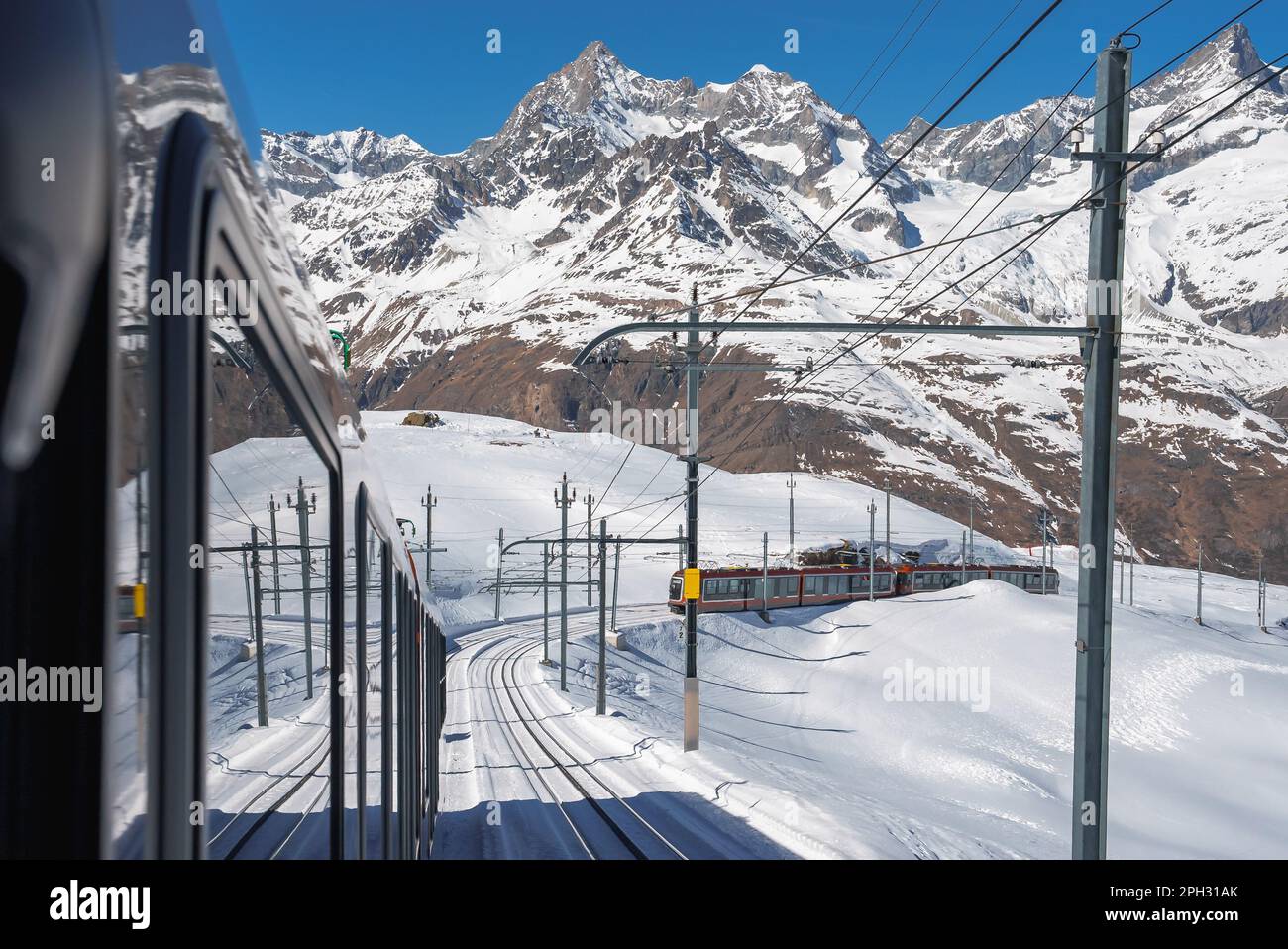 The train of Gonergratbahn running to the Gornergrat station and ...
