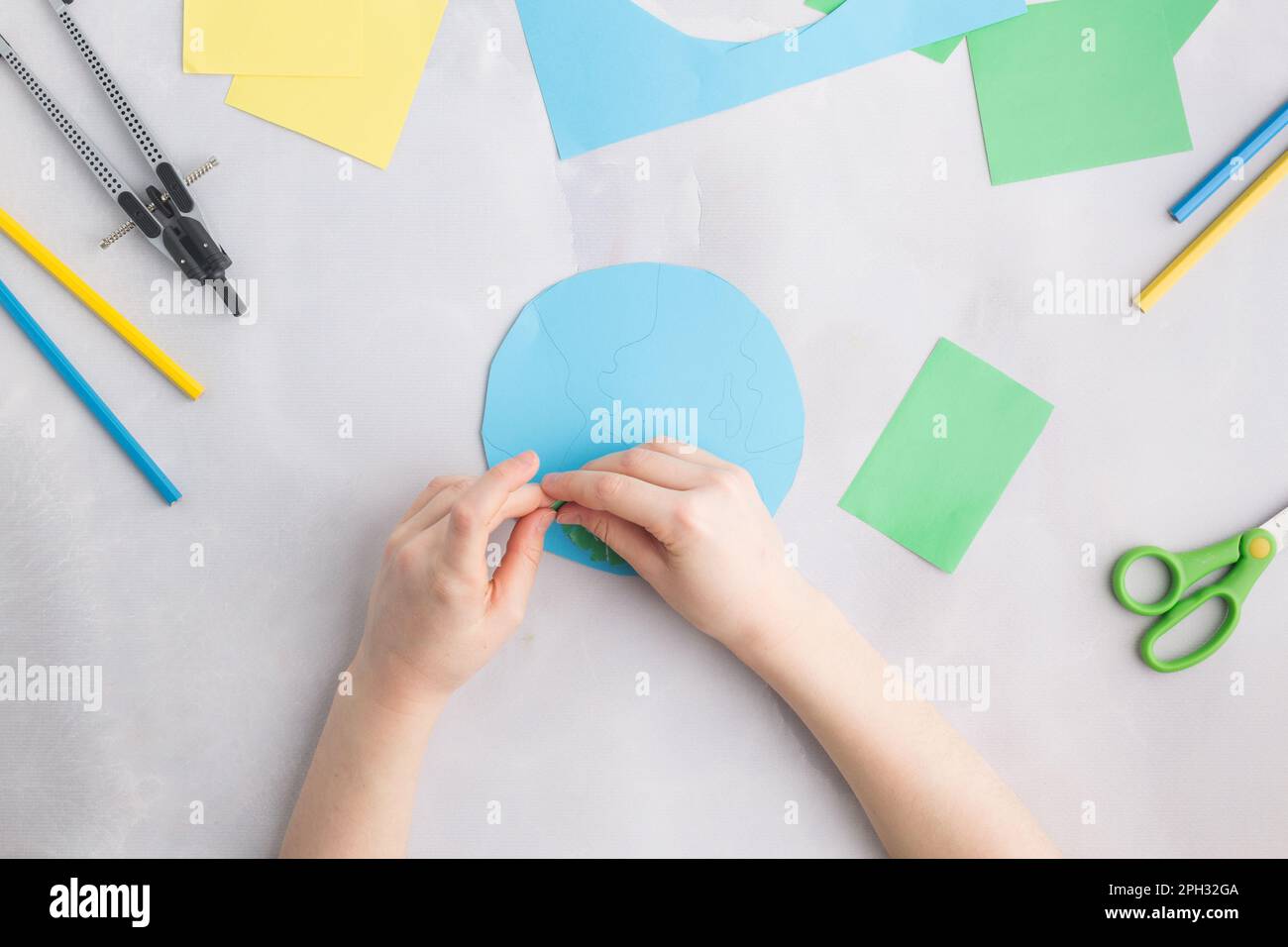 earth cut from paper around trees earth day concept kid's paper craft ...