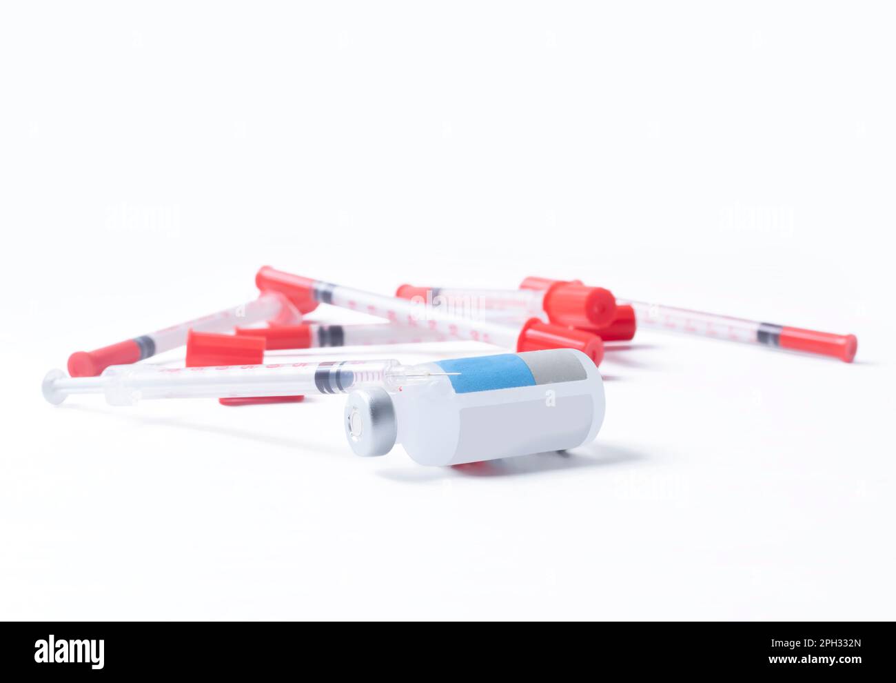 Medical vials and syringes on a white background Stock Photo - Alamy